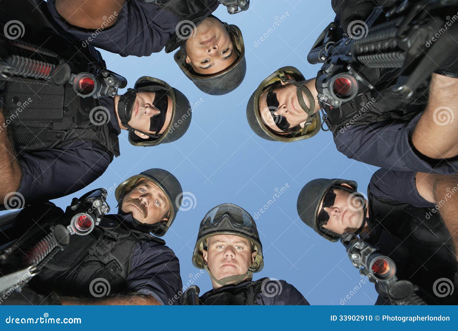 Policemen Standing Against Sky Stock Photo - Image of multiethnic ...