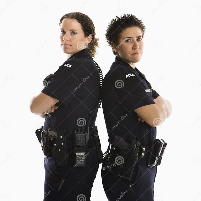 Policewomen back to back. stock photo. Image of officer - 3421346