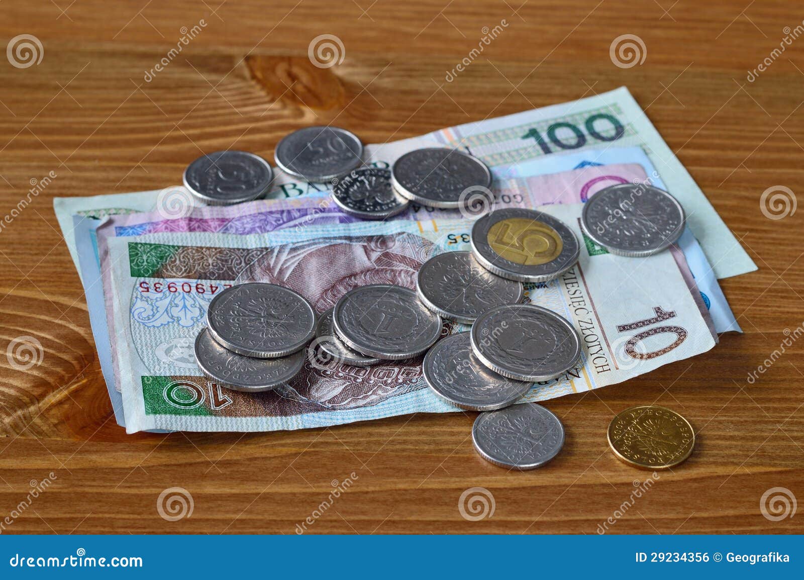Polish Money Laying on a Table. PLN Banknotes and Coins Stock Photo ...