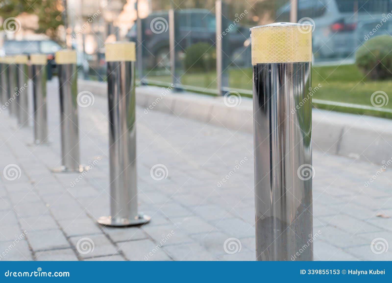 Polished Steel Bollards Lining a Modern Urban Pathway Stock Image ...