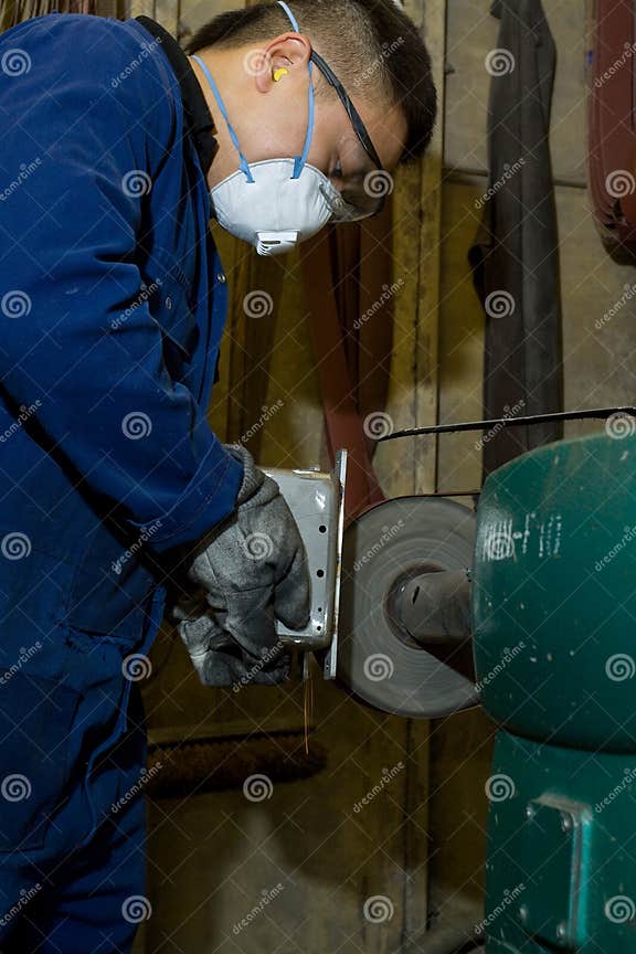 Polishing Metal in Workshop Stock Photo - Image of polishing, hand: 9927988