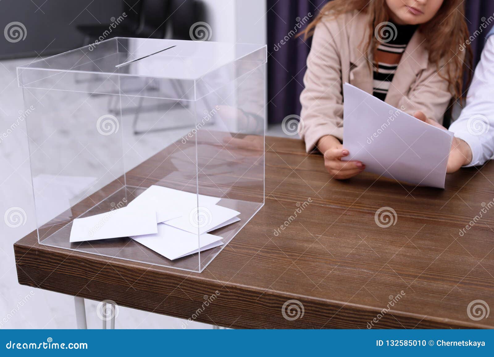 Polling Station Workers at Table Stock Photo - Image of document ...