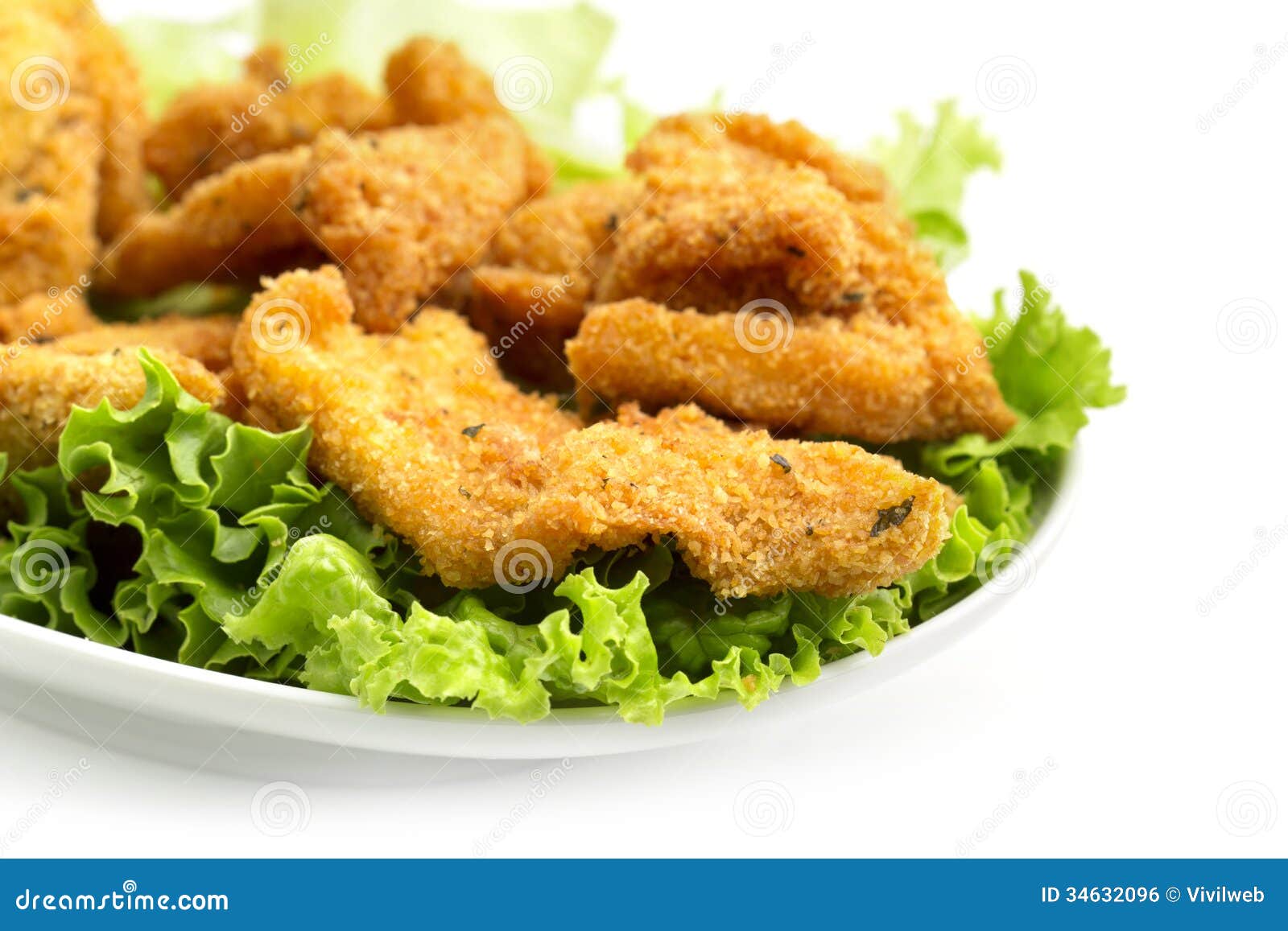 Pollo frito en lechuga foto de archivo. Imagen de pecho - 34632096