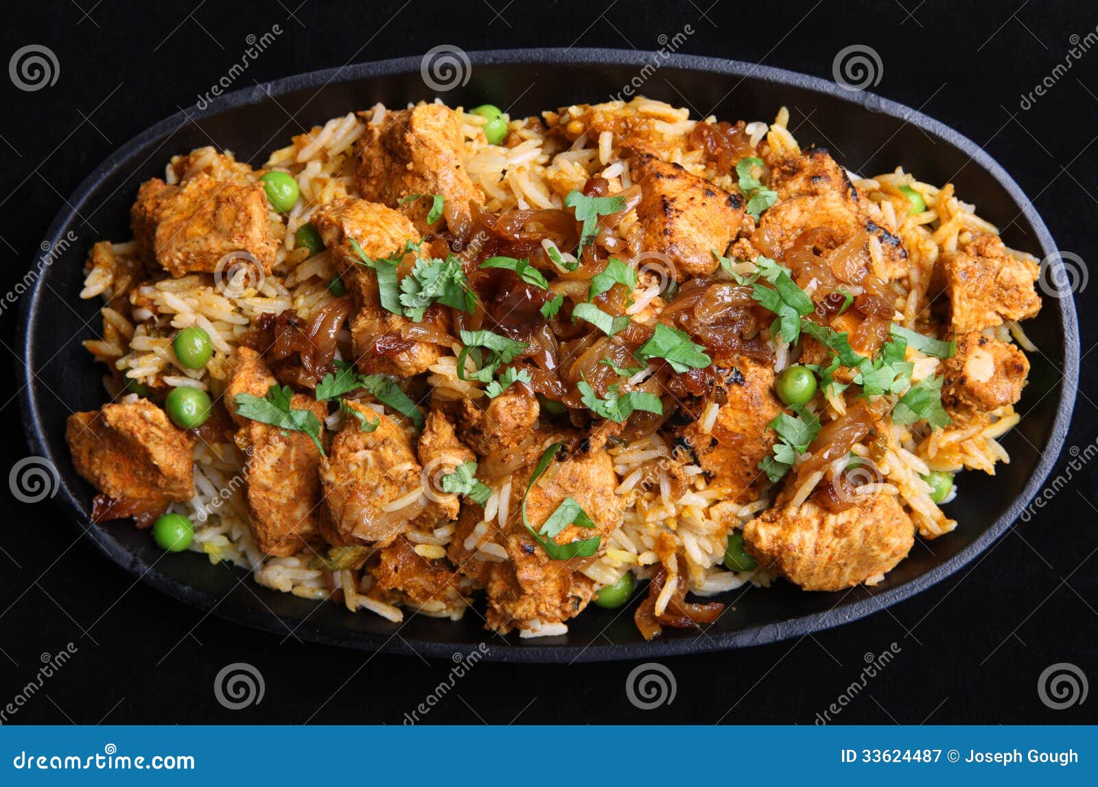 Pollo indio Tikka Biriyani imagen de archivo. Imagen de coriandro ...