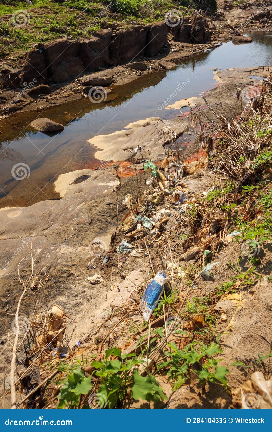 Polluted Garbage and Trash in a River Bank Stock Image - Image of ...