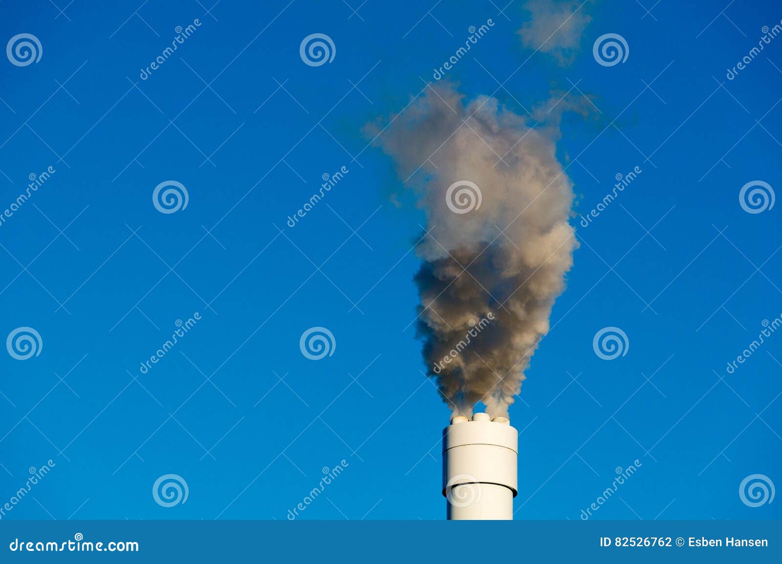Polluted Smoke Against a Clear Blue Sky from the Tall Chimney Stock ...