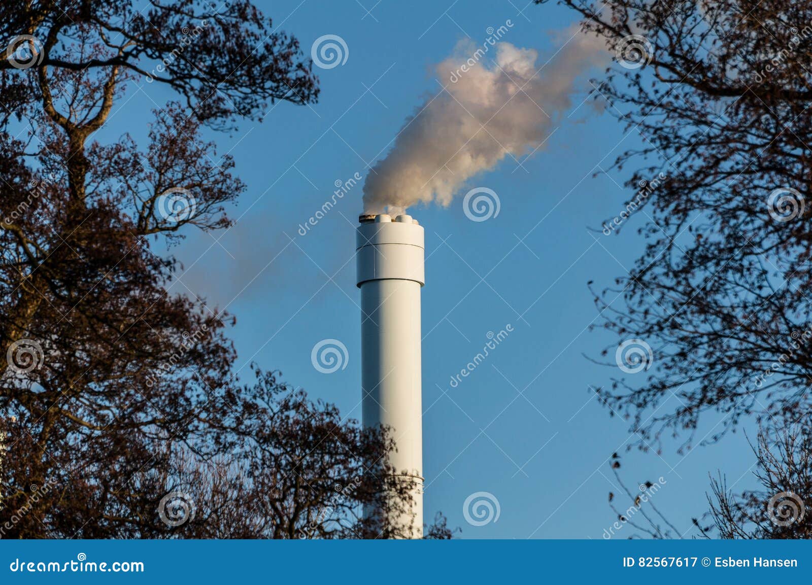 Polluted Smoke Against a Clear Blue Sky from the Tall Chimney Stock ...