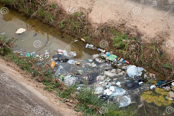 Polluted Water and Garbage in Water Channel Stock Photo - Image of ...