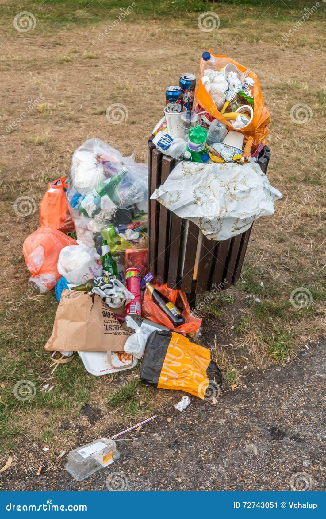 Overflowing Trash Bins In The Park. Dumpster Being Full With Garbage ... Overflowing Trash Bins In The Park. Dumpster Being Full With Garbage ...