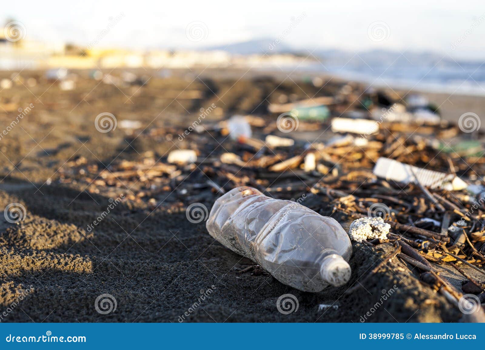 Pollution - Plastic Water Bottle on a Beach Stock Image - Image of ...
