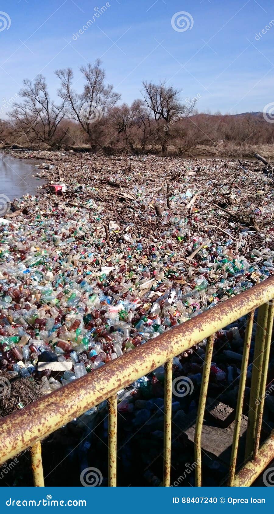 Polution with Plastic Waste on a River Stock Photo - Image of plastic ...