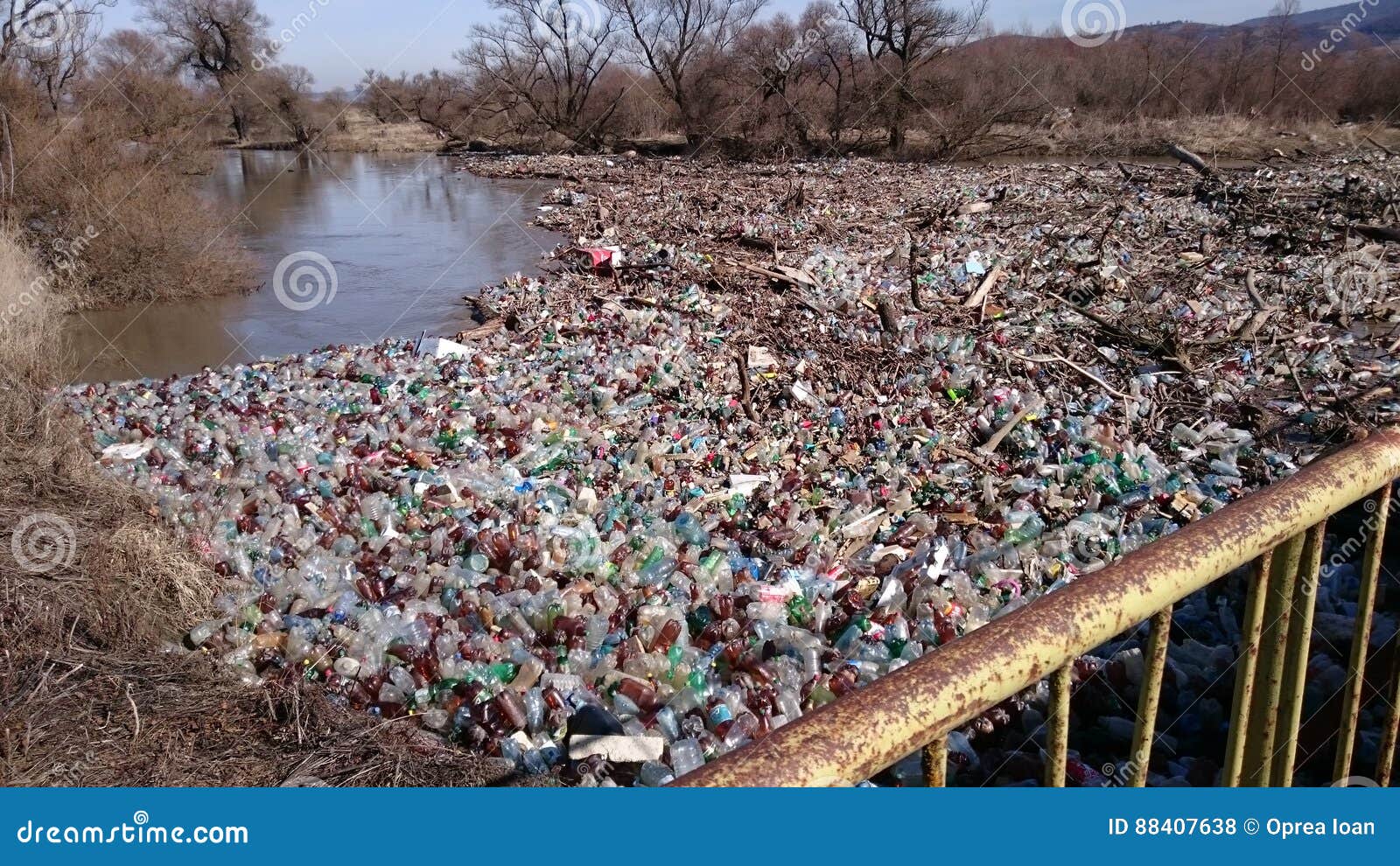 Polution with Plastic Waste on a River Stock Photo - Image of full ...