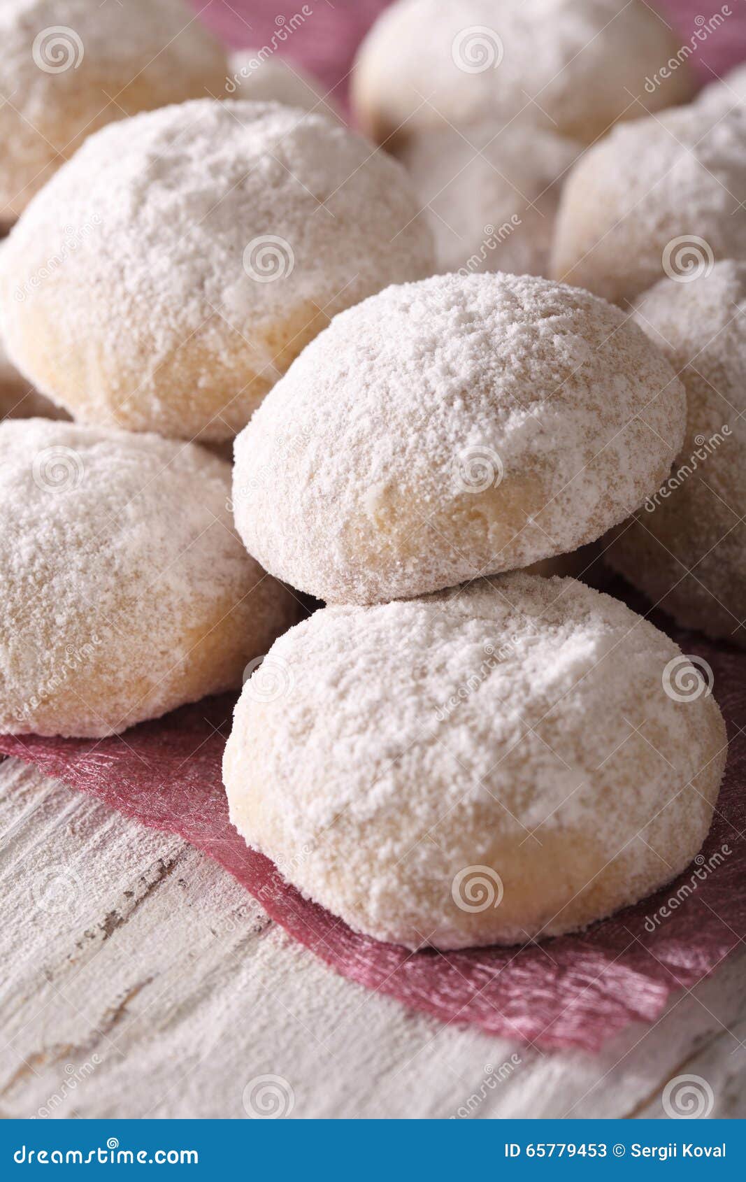 Polvoron Cookies with Powdered Sugar Macro on a Table. Vertical Stock ...