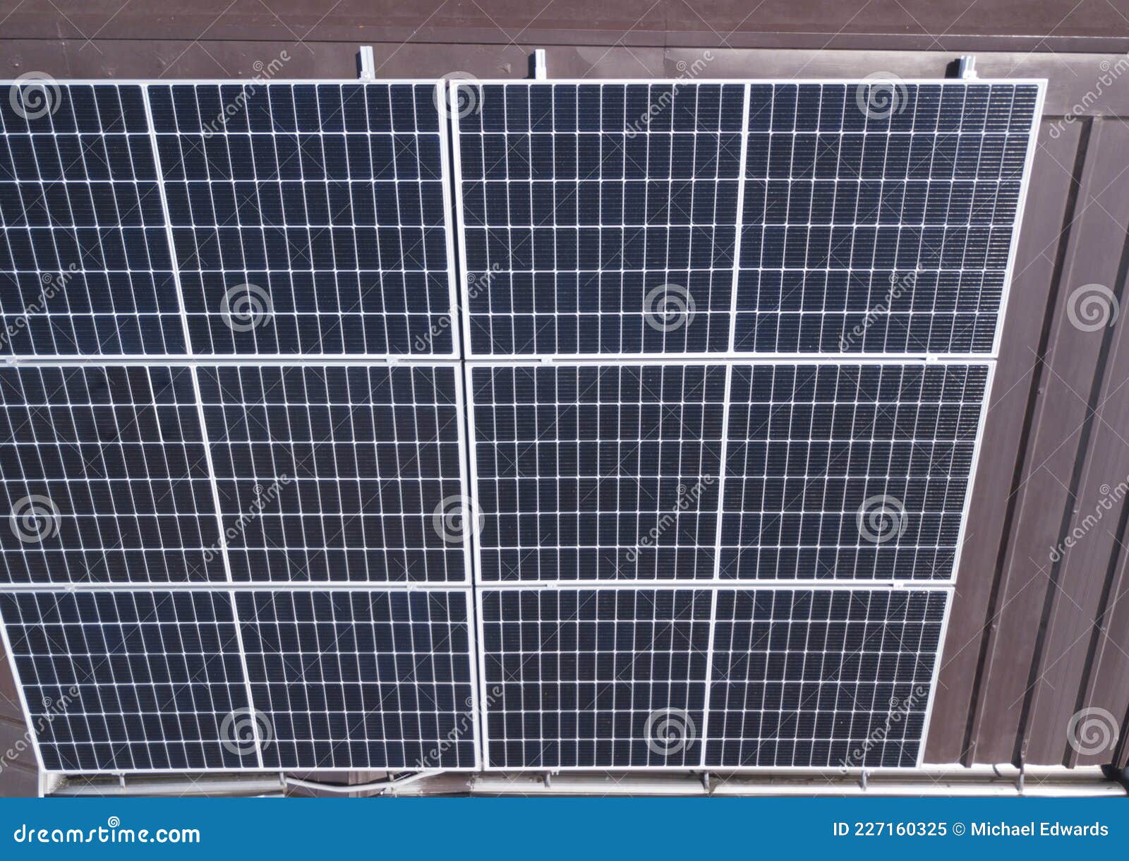 A Polycrystalline Solar Panel System Mounted on a Ribbed Metal Roofing ...