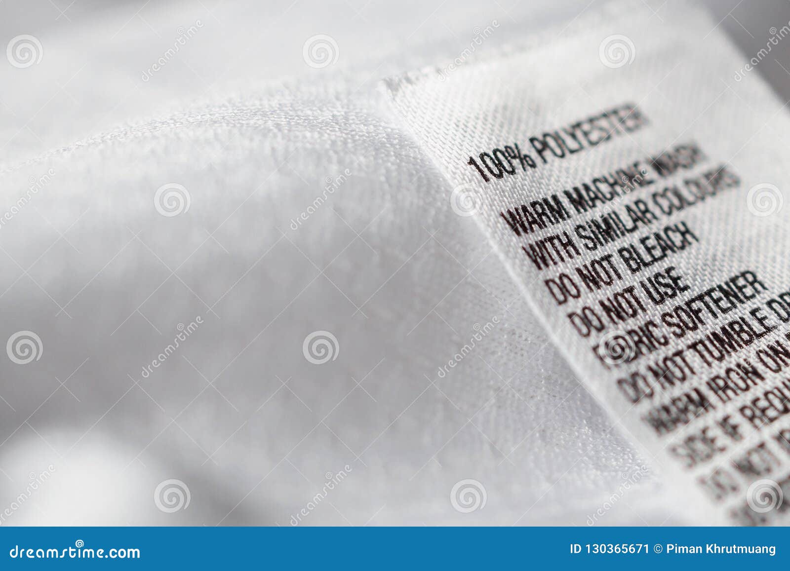 Polyester Fabric Clothing Label with Laundry Instructions Stock Image ...