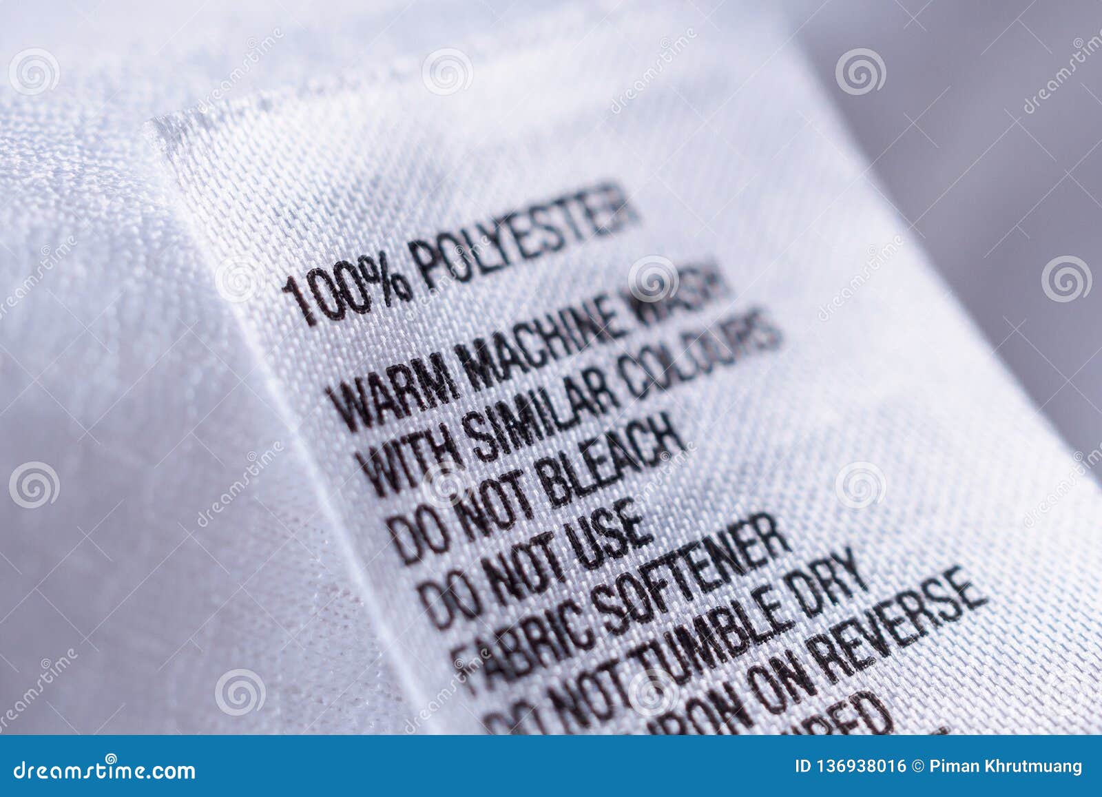 Polyester Fabric Clothing Label with Laundry Instructions Stock Photo ...