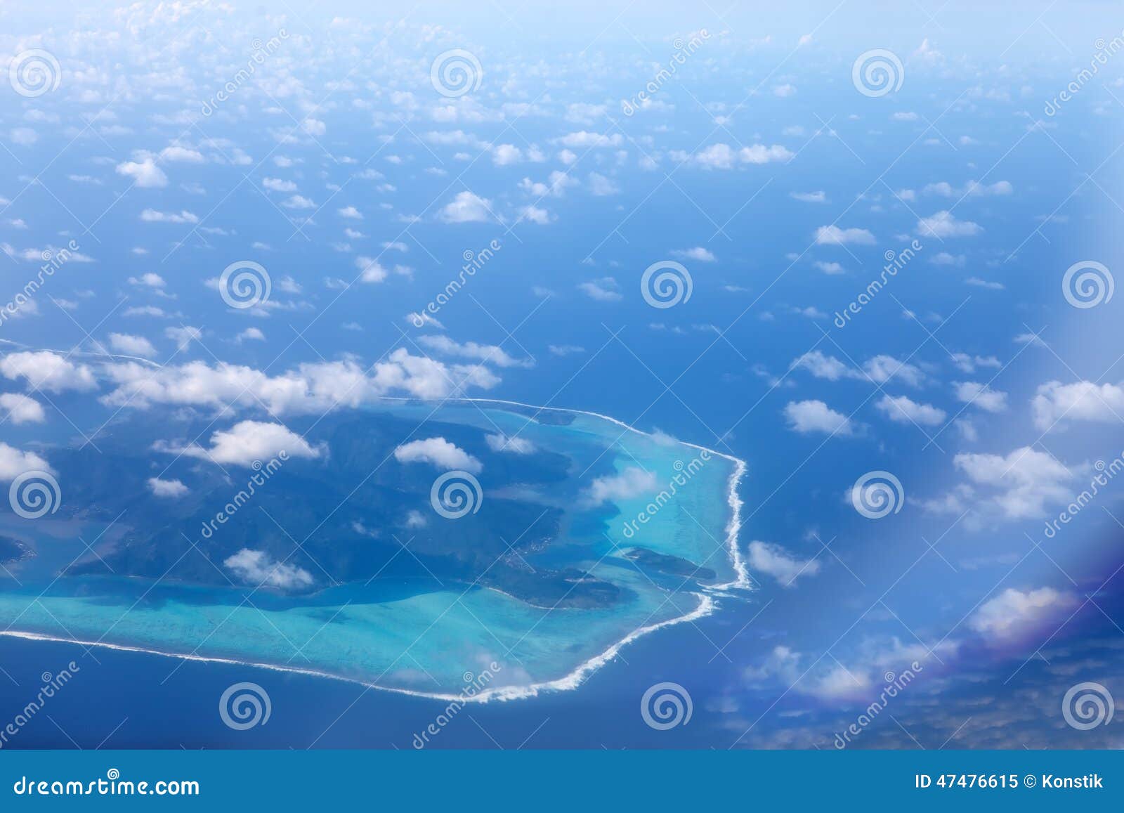 Polynesia. the Atoll in Ocean through Clouds. Aerial View. Stock Image ...