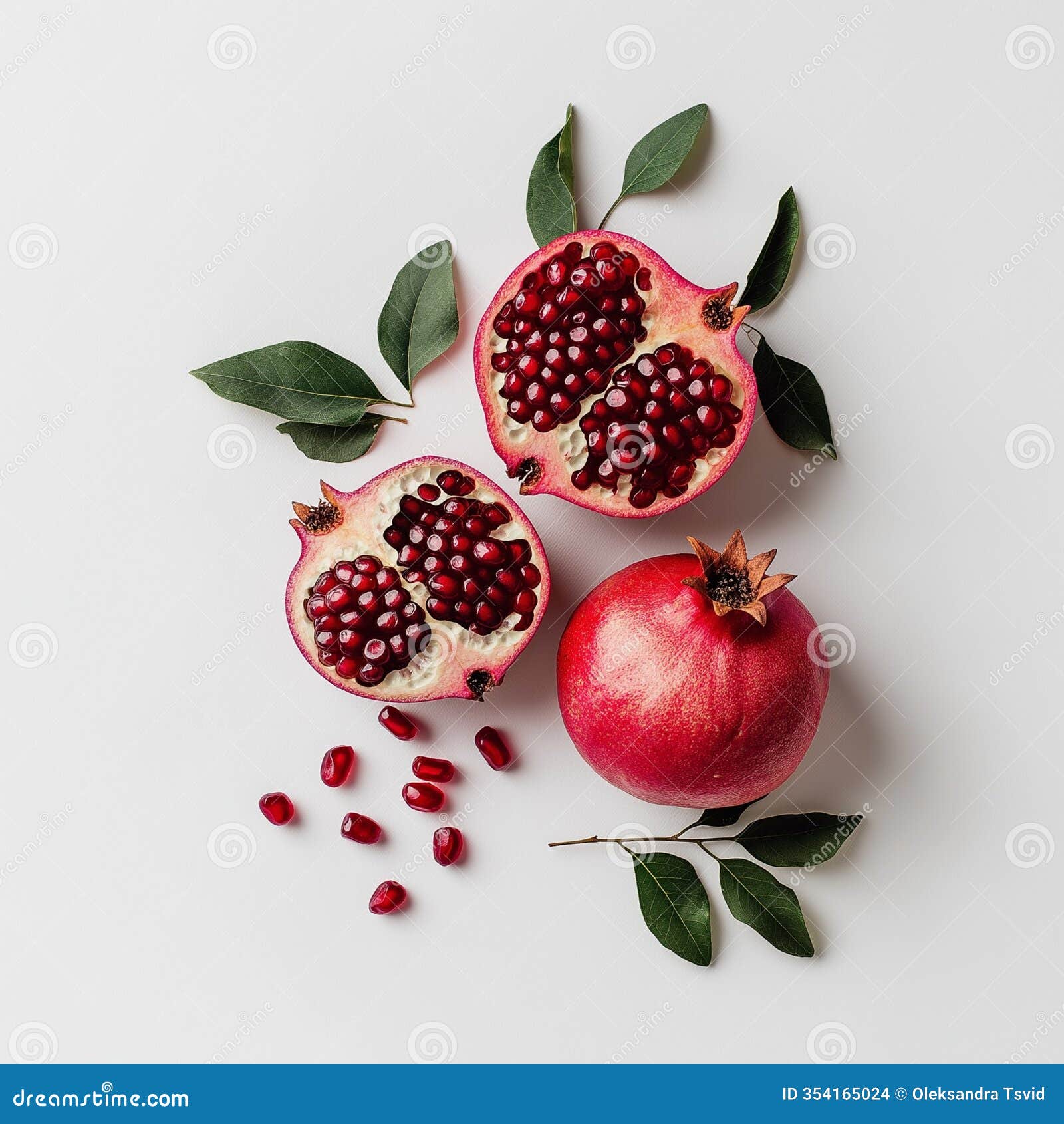 Pomegranate Seeds, One Ruby-red Whole Fruit and Fruit Slices Isolated ...