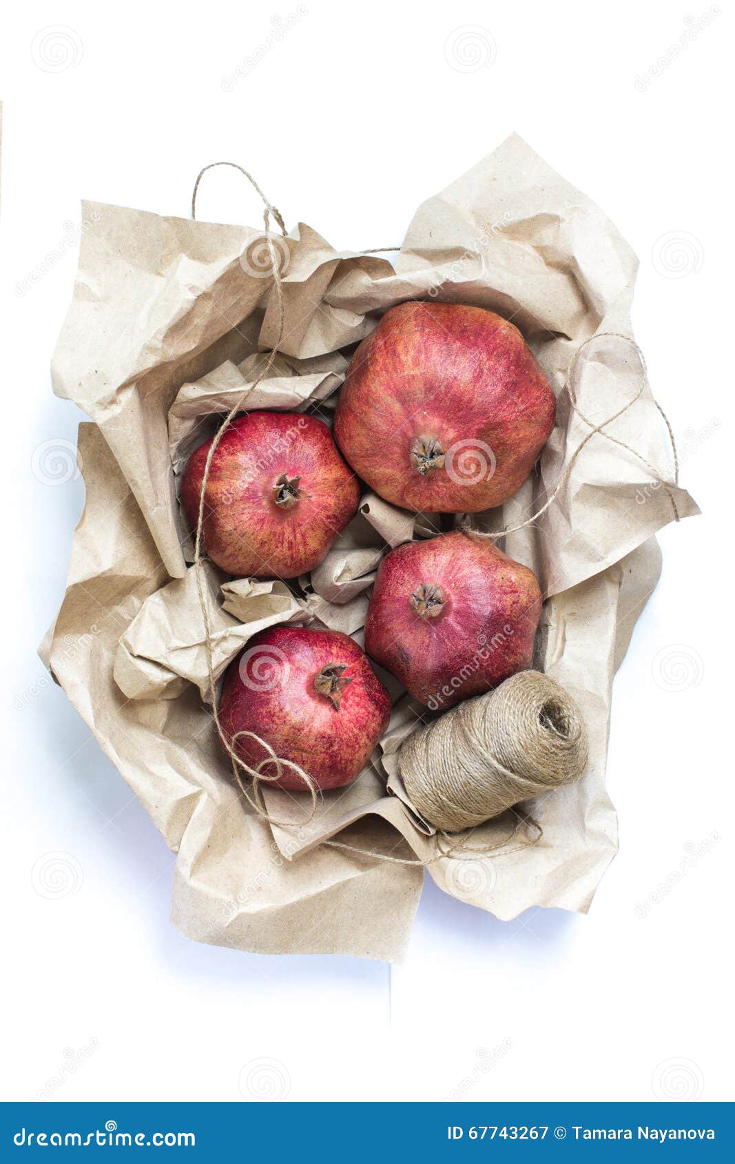 Pomegranate Wrapped in Craft Paper Stock Image - Image of pomegranate ...