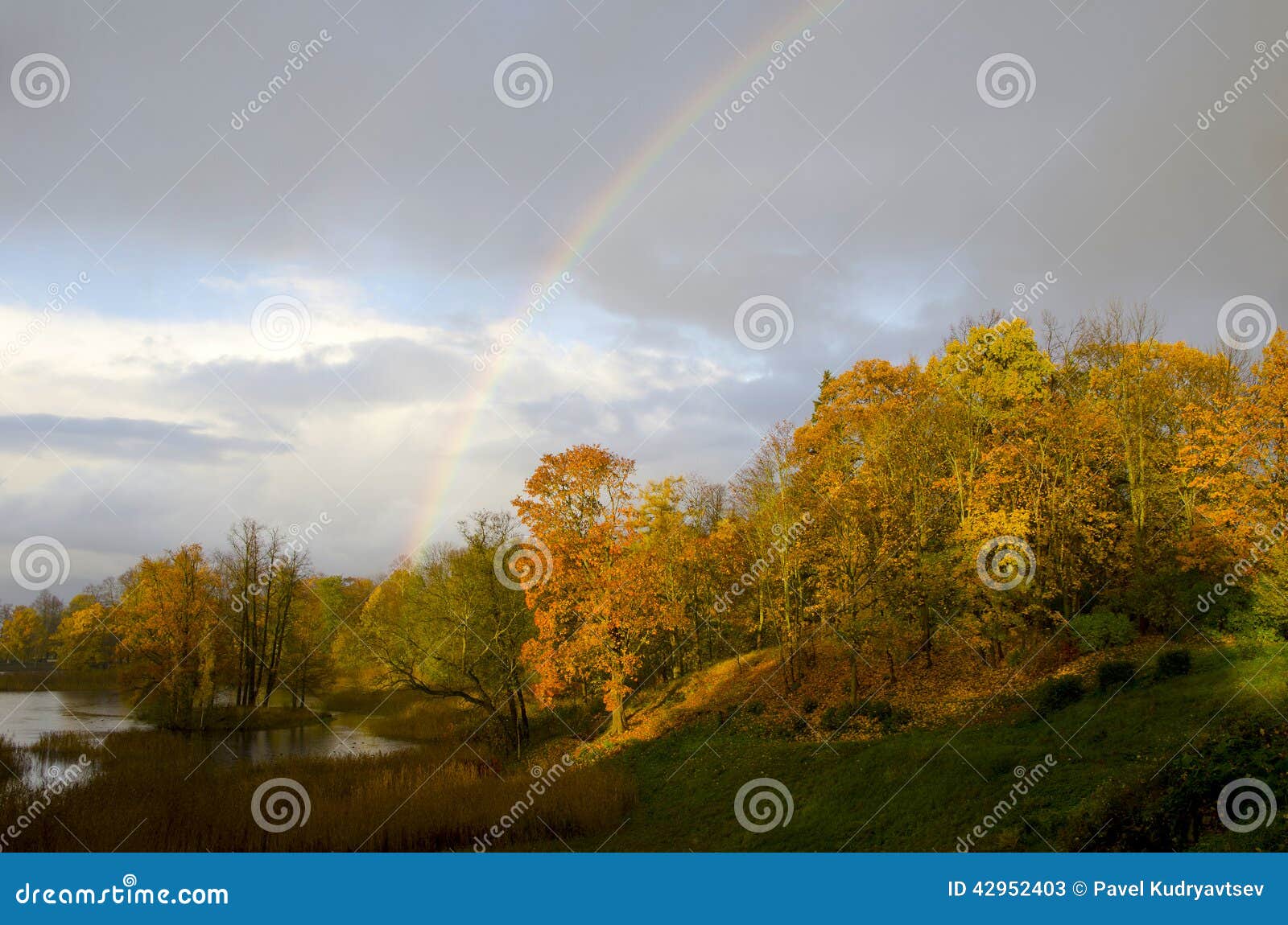 Pond in autumn and rainbow stock image. Image of park - 42952403