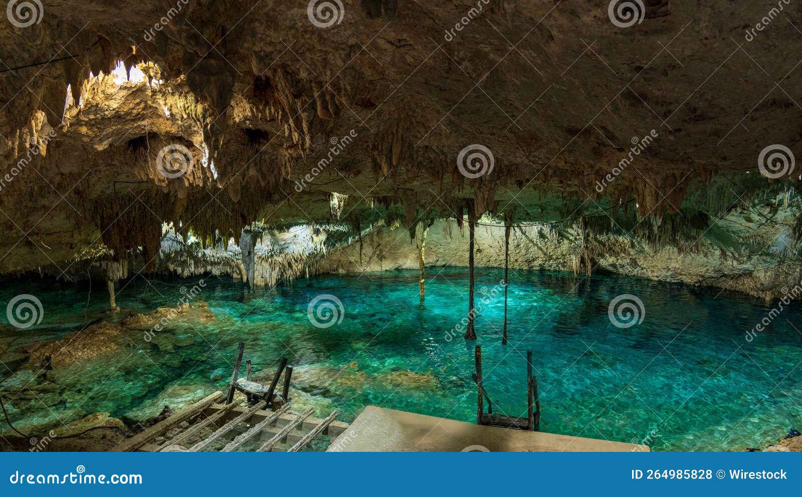 Pond in a cave with lights stock photo. Image of beauty - 264985828