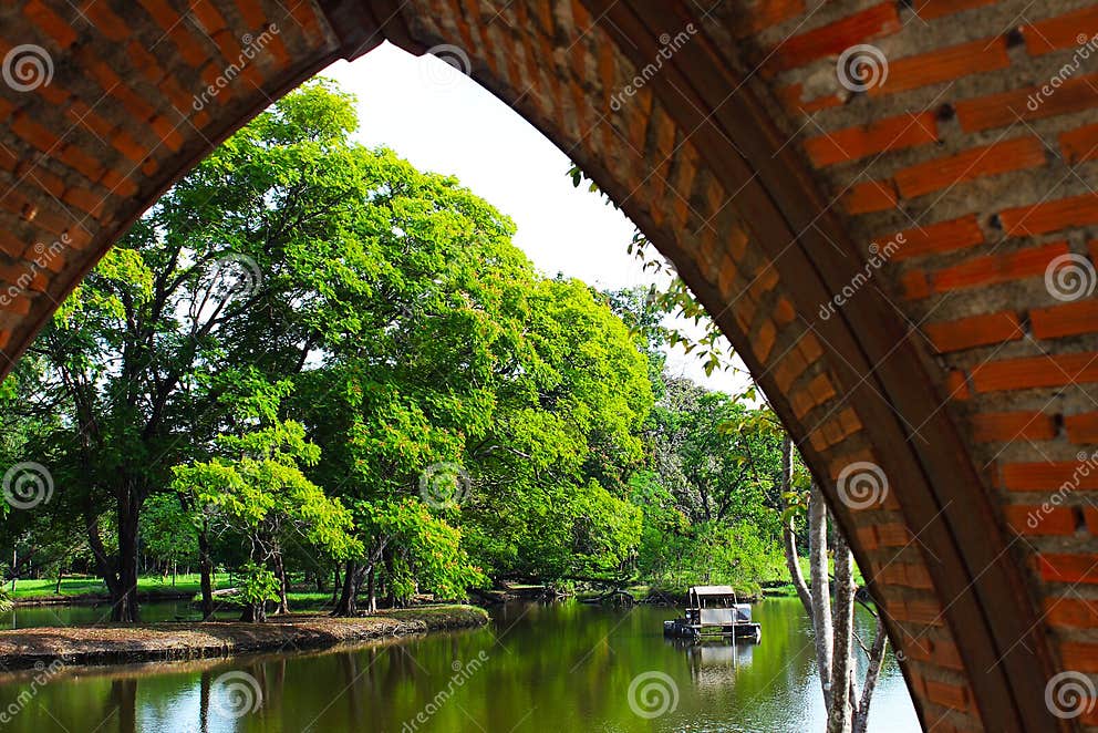 The Pond View in the Park Looking through the Red Bricks Frame Stock ...