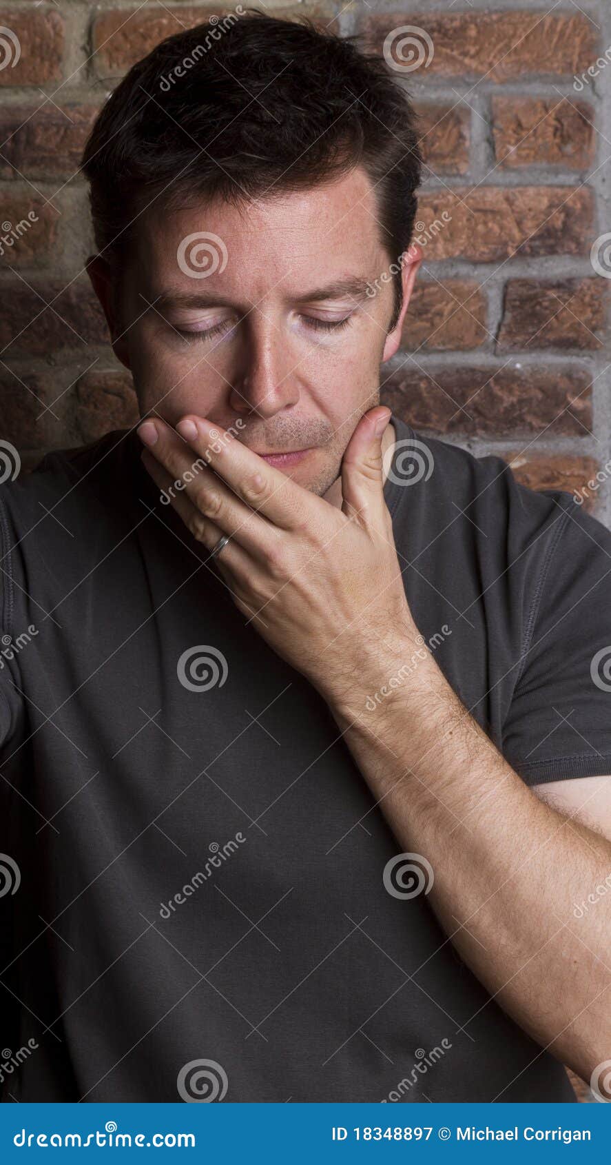 Pondering Male with Head in Hand Stock Image - Image of shirt, hold ...