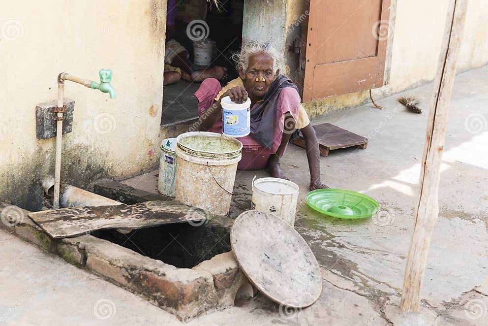 Indian Poor Woman Wash Clothes In Street Rural Village Editorial Image