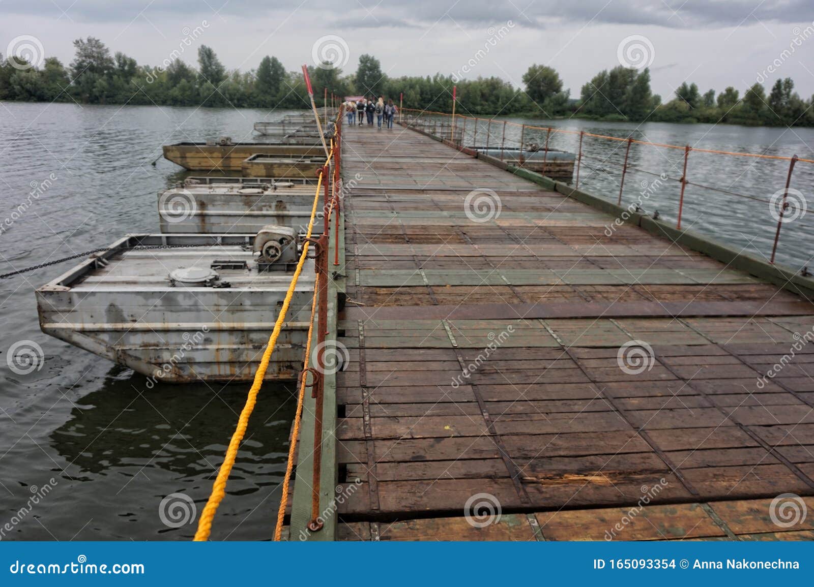 Pontoon Bridge Over the River Made of Old Ships. Stock Photo - Image of ...