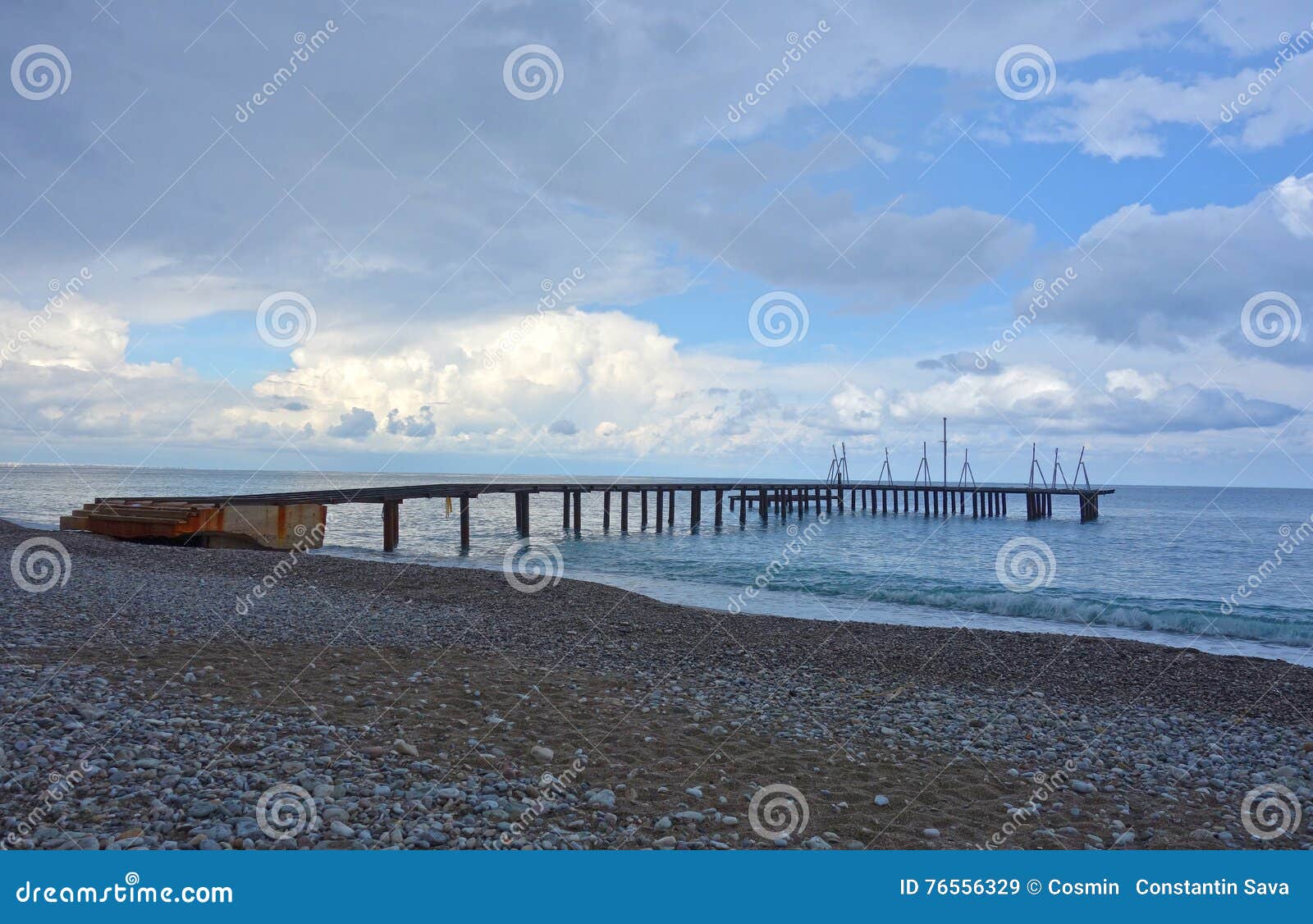 Pontoon bridge to the sea stock image. Image of scene - 76556329