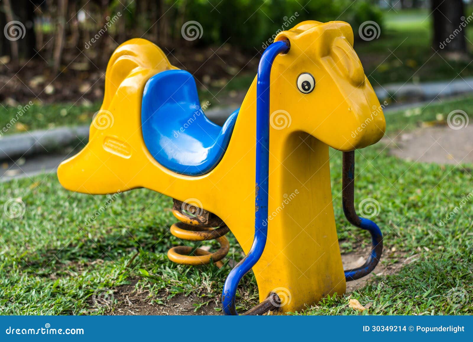 Pony toy in park stock photo. Image of baby, play, area - 30349214