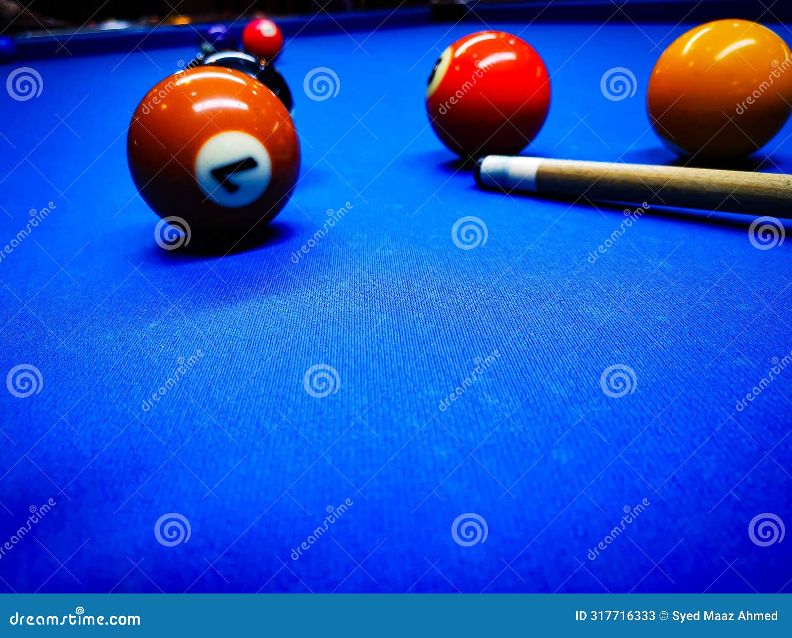 4 Pool Ball and a Pool Cue in Focus on a Blue Pool Table, Snooker Table ...