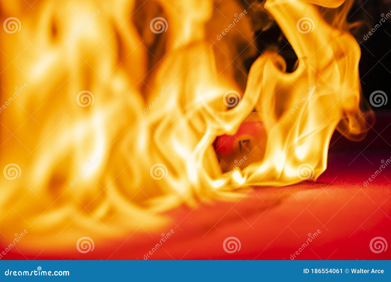 Pool Balls are Lit on Fire while Sitting on a Pool Table in an Outdoor ...