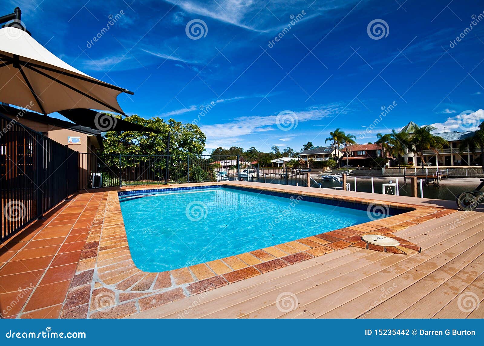 Pool Bathed in Sunshine stock photo. Image of home, water - 15235442