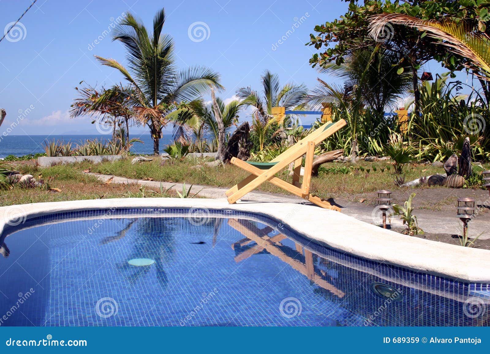 Pool at the beach stock image. Image of palms, water, ocean - 689359