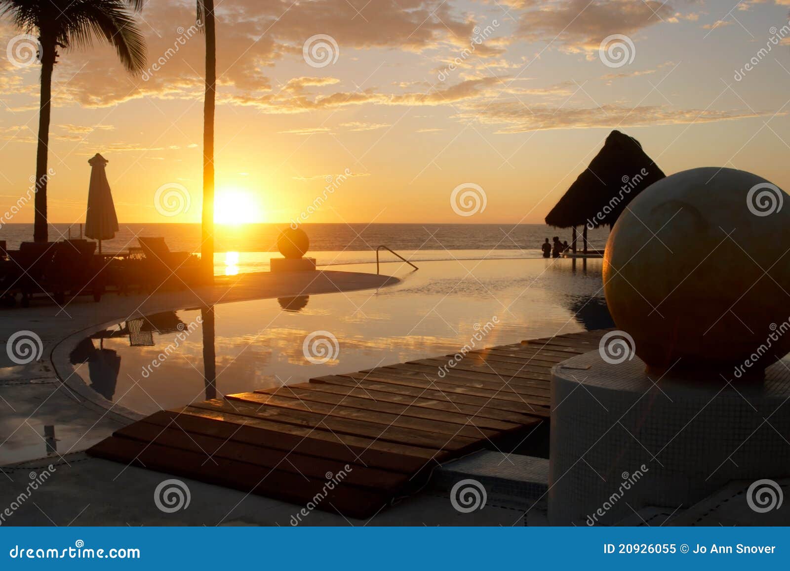 Pool and beach at sunset stock image. Image of edge, drink - 20926055