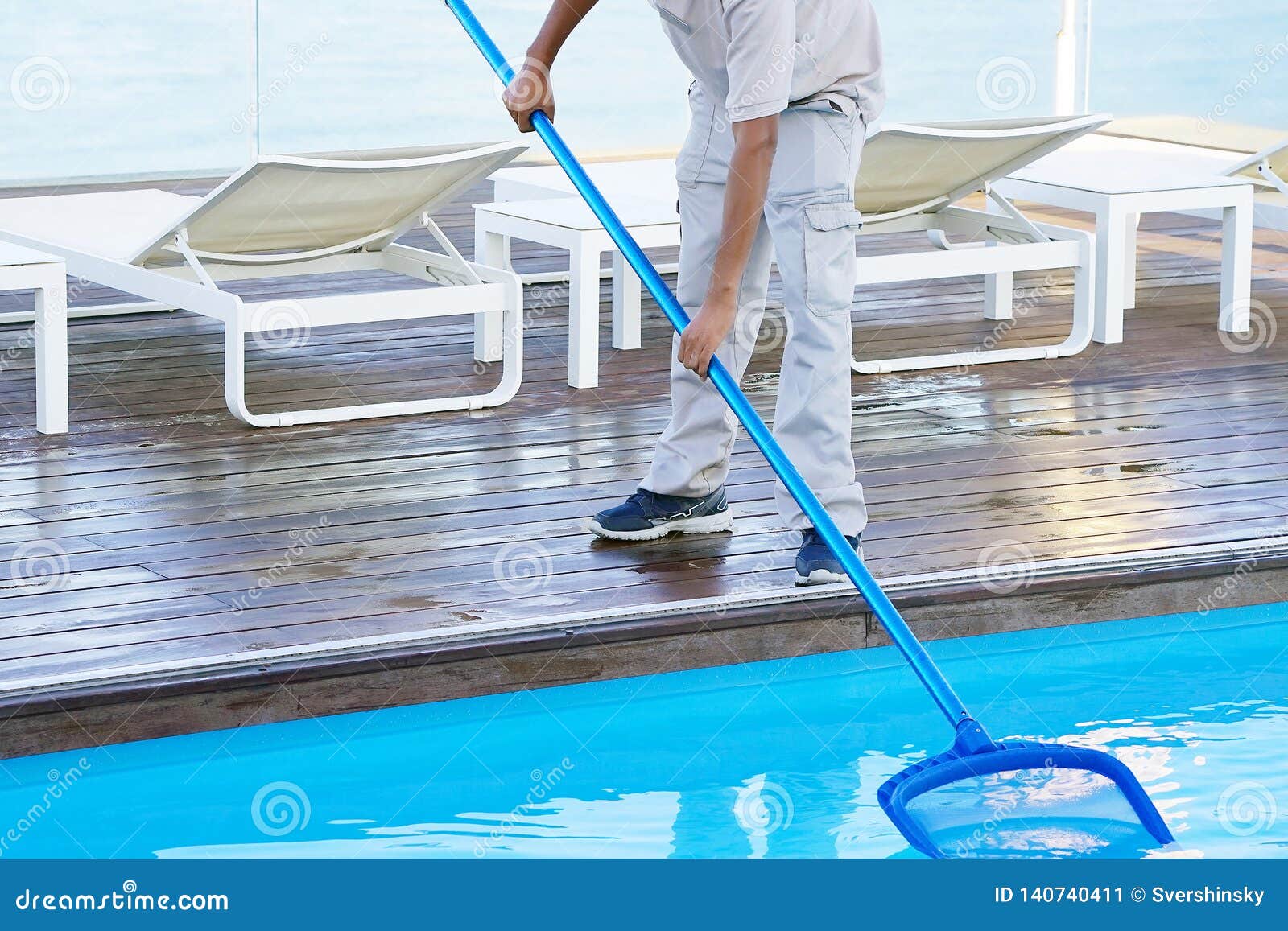 Hotel Staff Worker Cleaning the Pool Stock Image - Image of hand ...