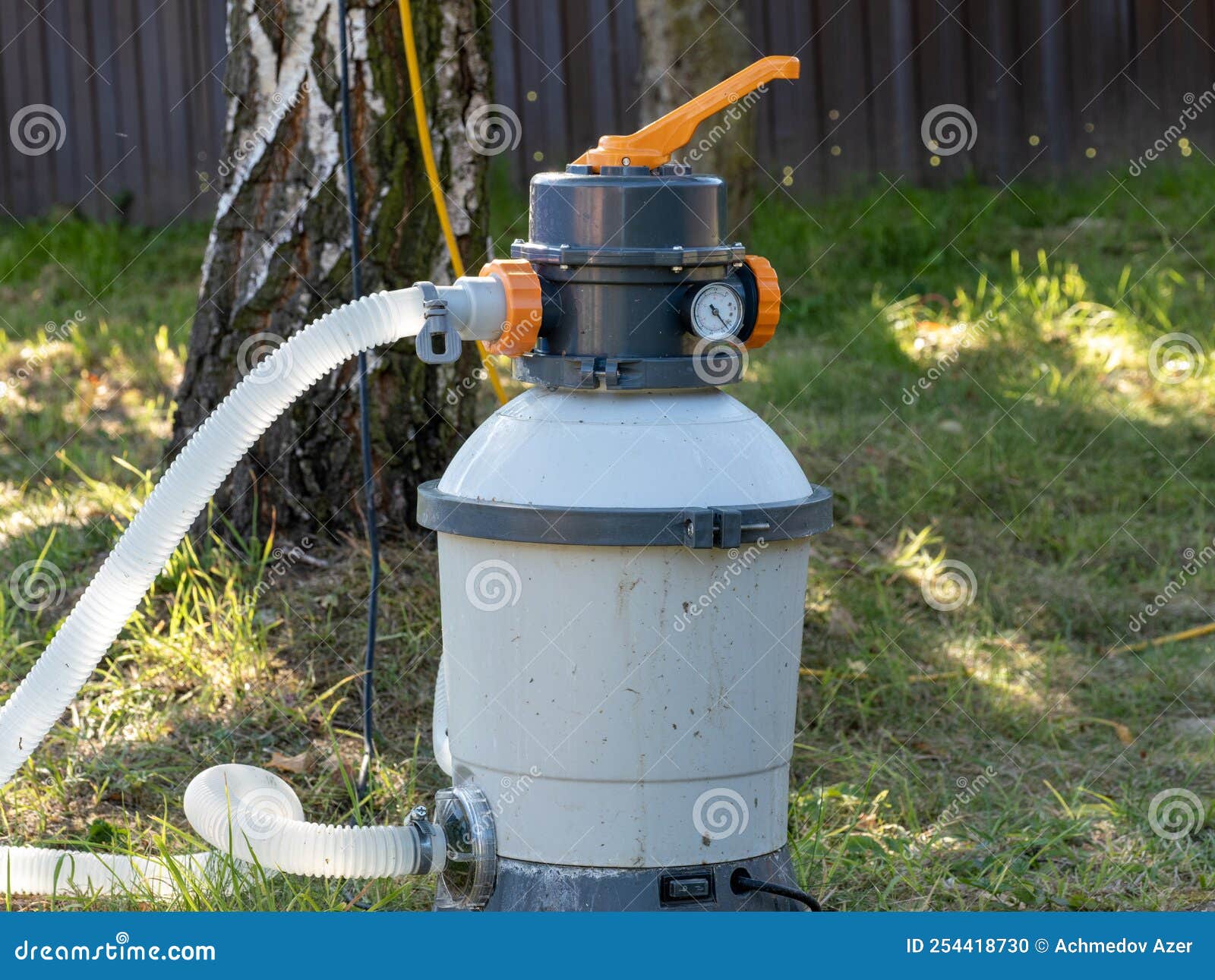 Pool cleaning with a pump stock photo. Image of cles - 254418730