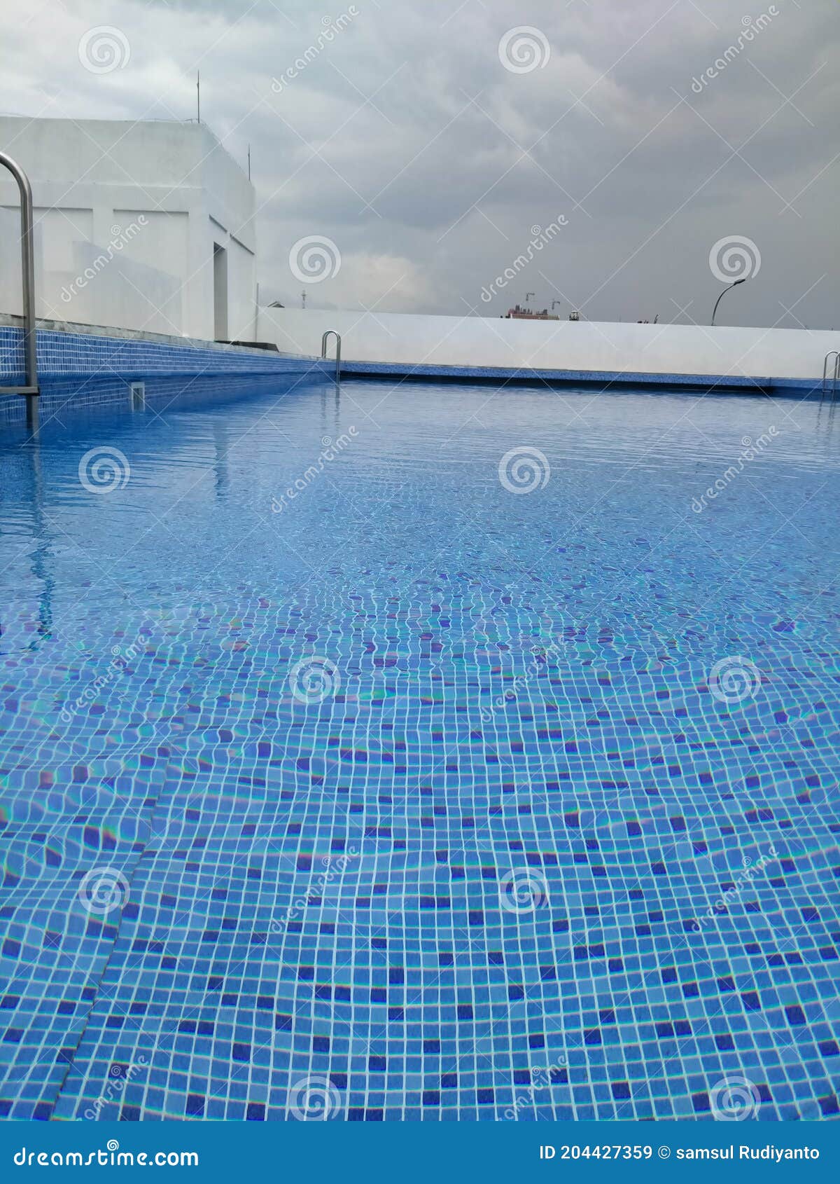 Pool in cloudy weather stock image. Image of estate - 204427359