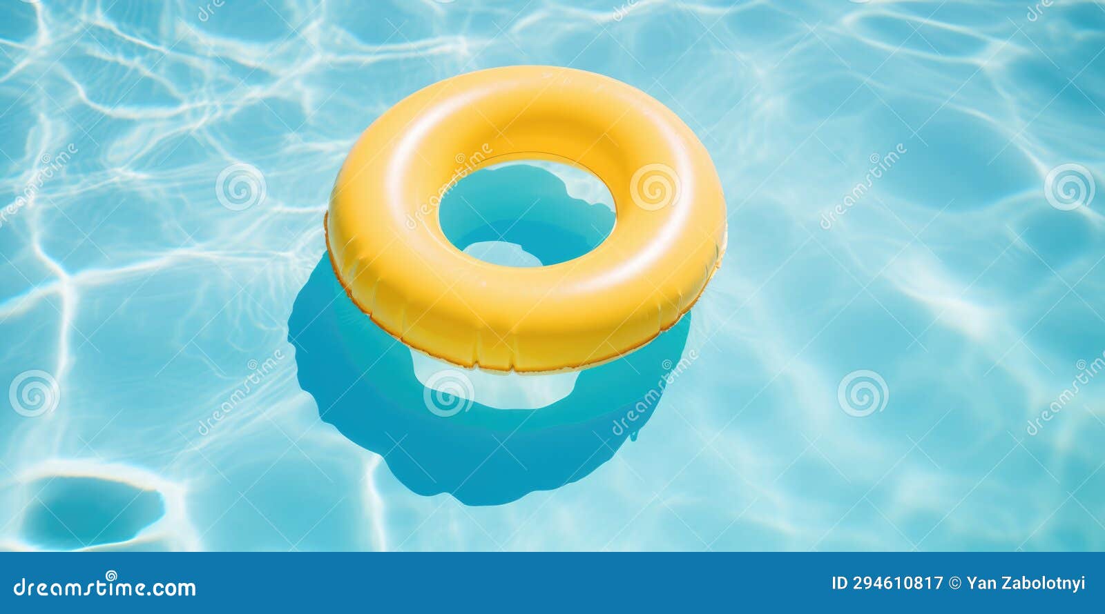 Pool Float in a Swimming Pool a Yellow Pool Float Ring Floating in a ...
