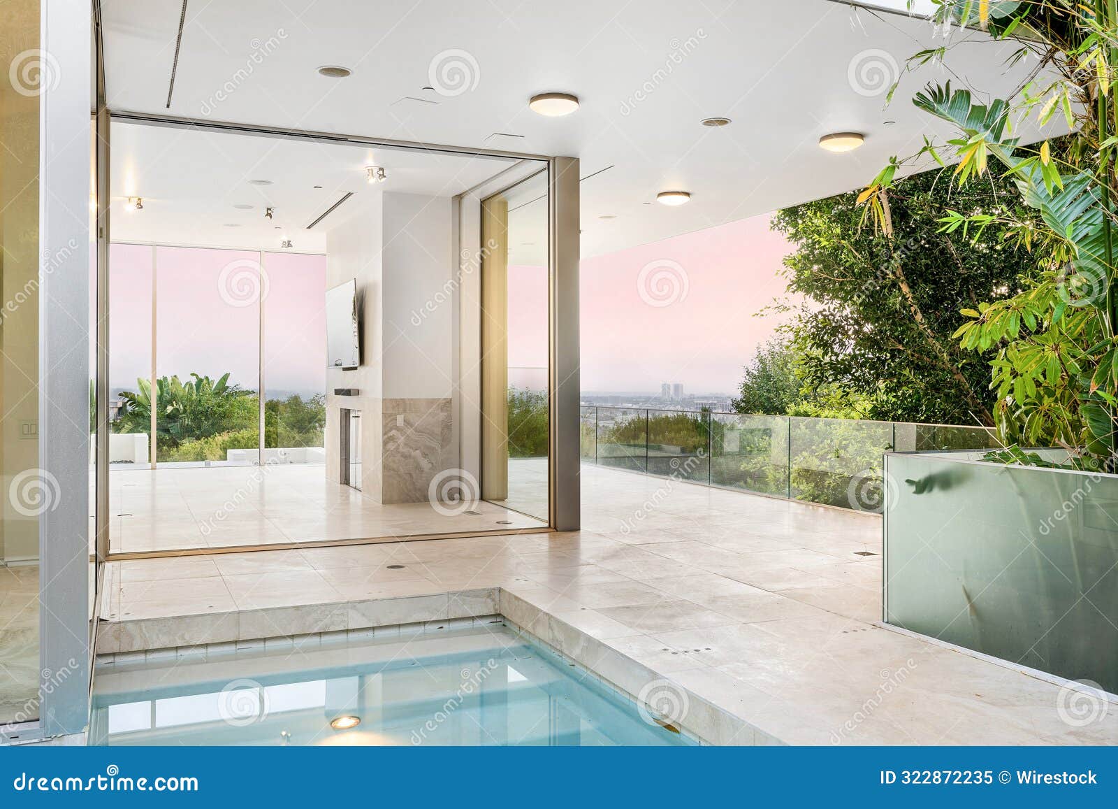 Pool beside Glass Doors Leading To a Patio Stock Image - Image of ...