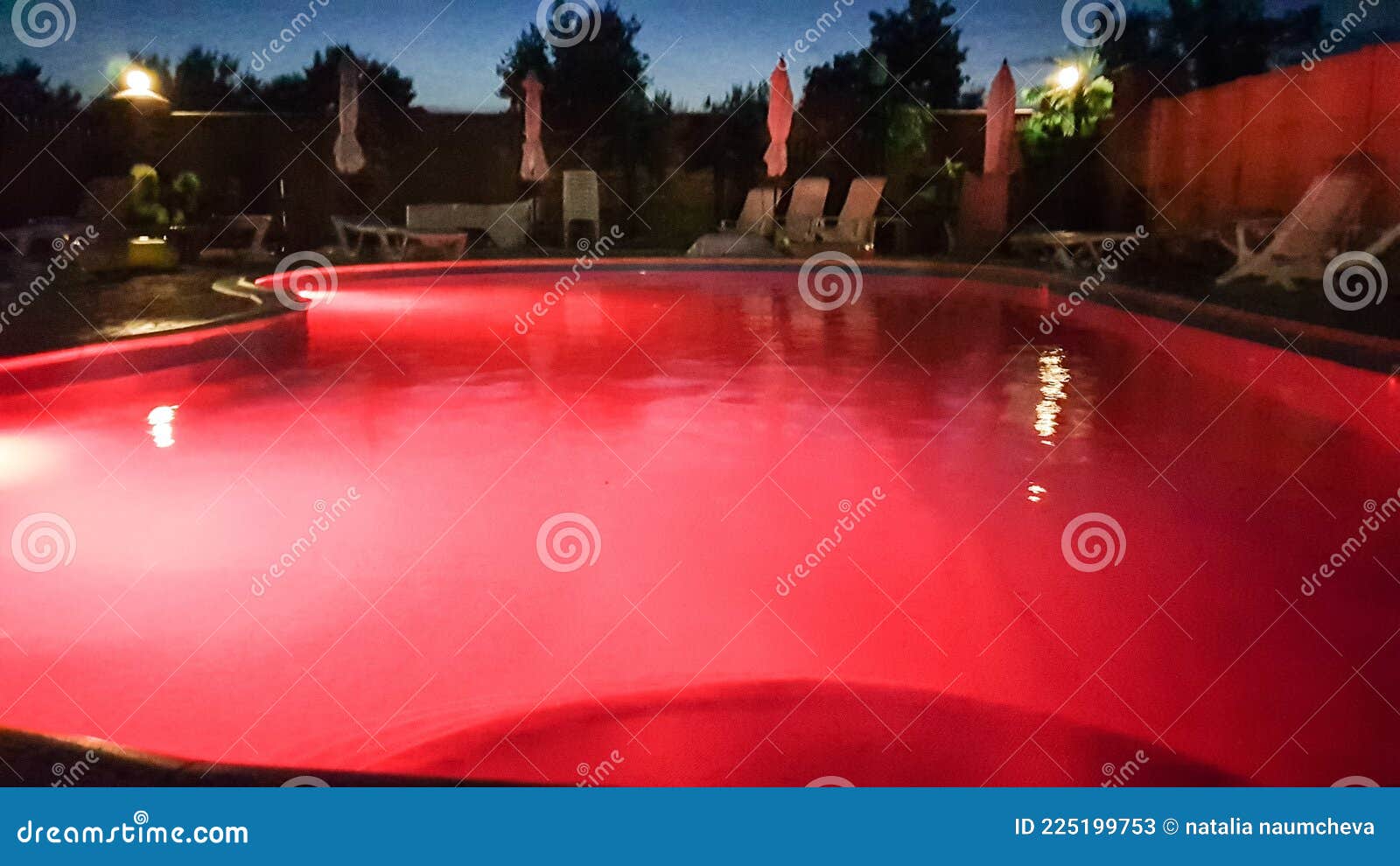 The Pool Glows Red at Night. Lighting Stock Image - Image of light ...
