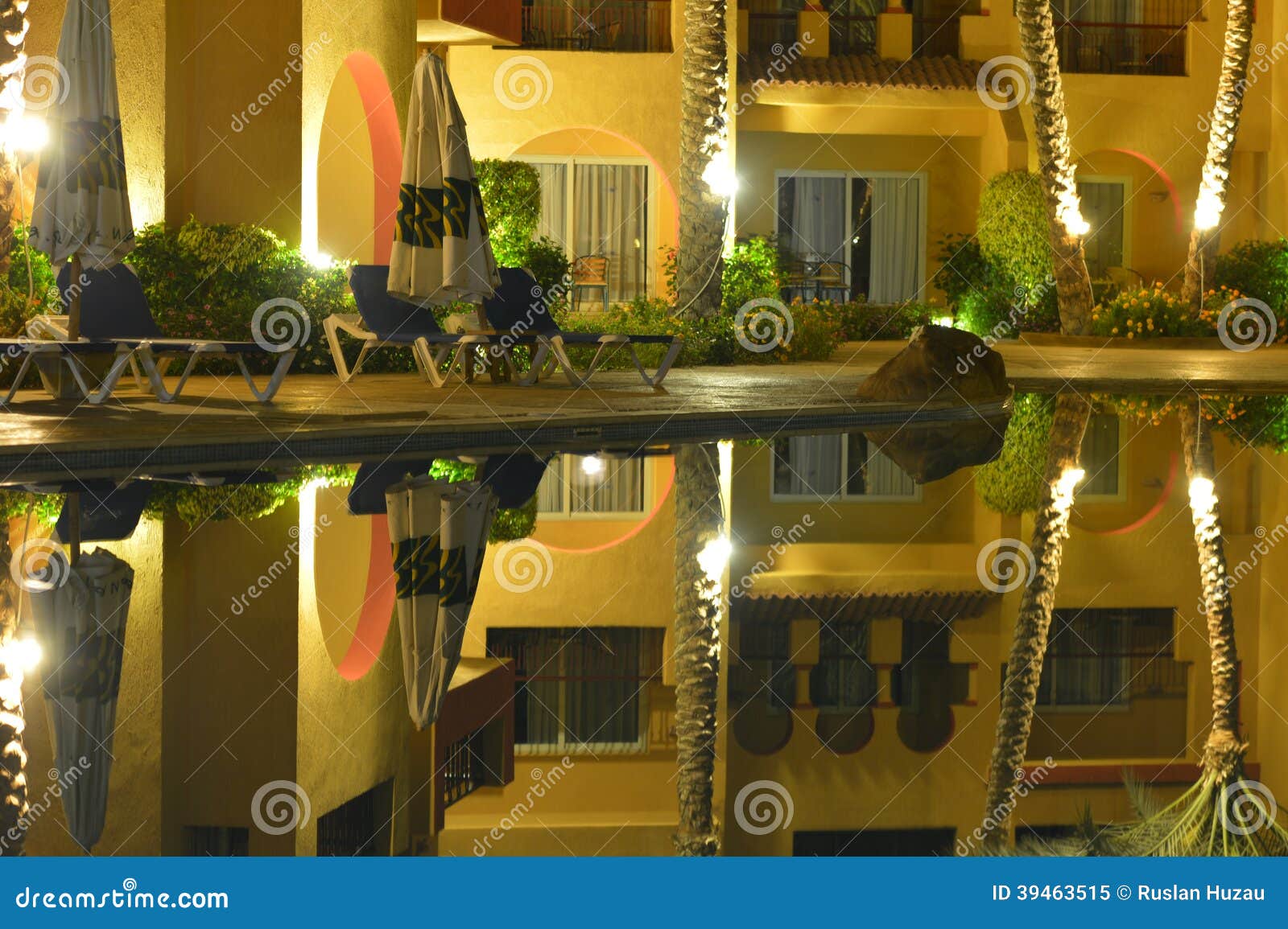 Pool at hotel in evening stock image. Image of night - 39463515