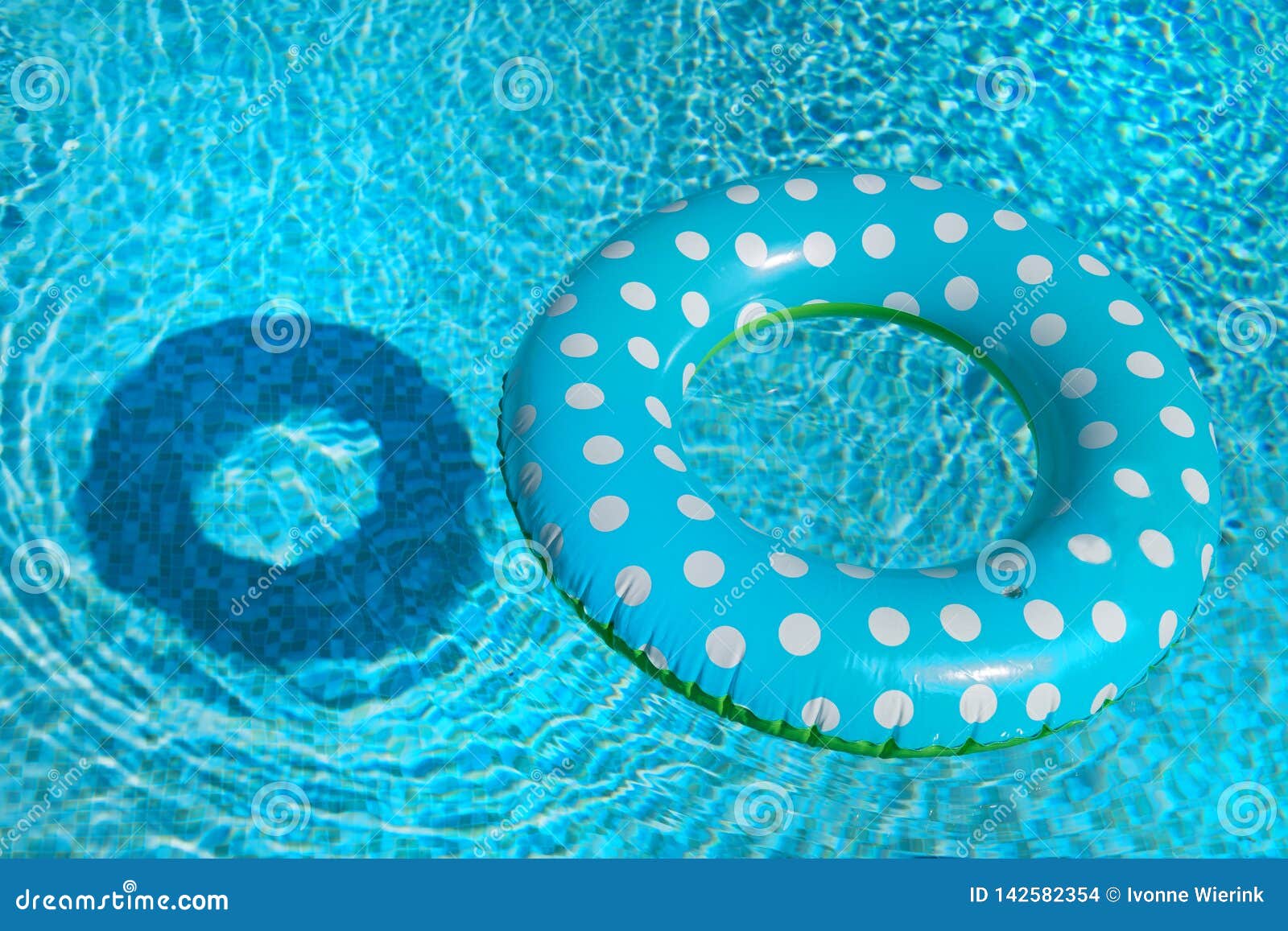 Pool with Inflatable Blue Ring Stock Photo - Image of reflection, space ...