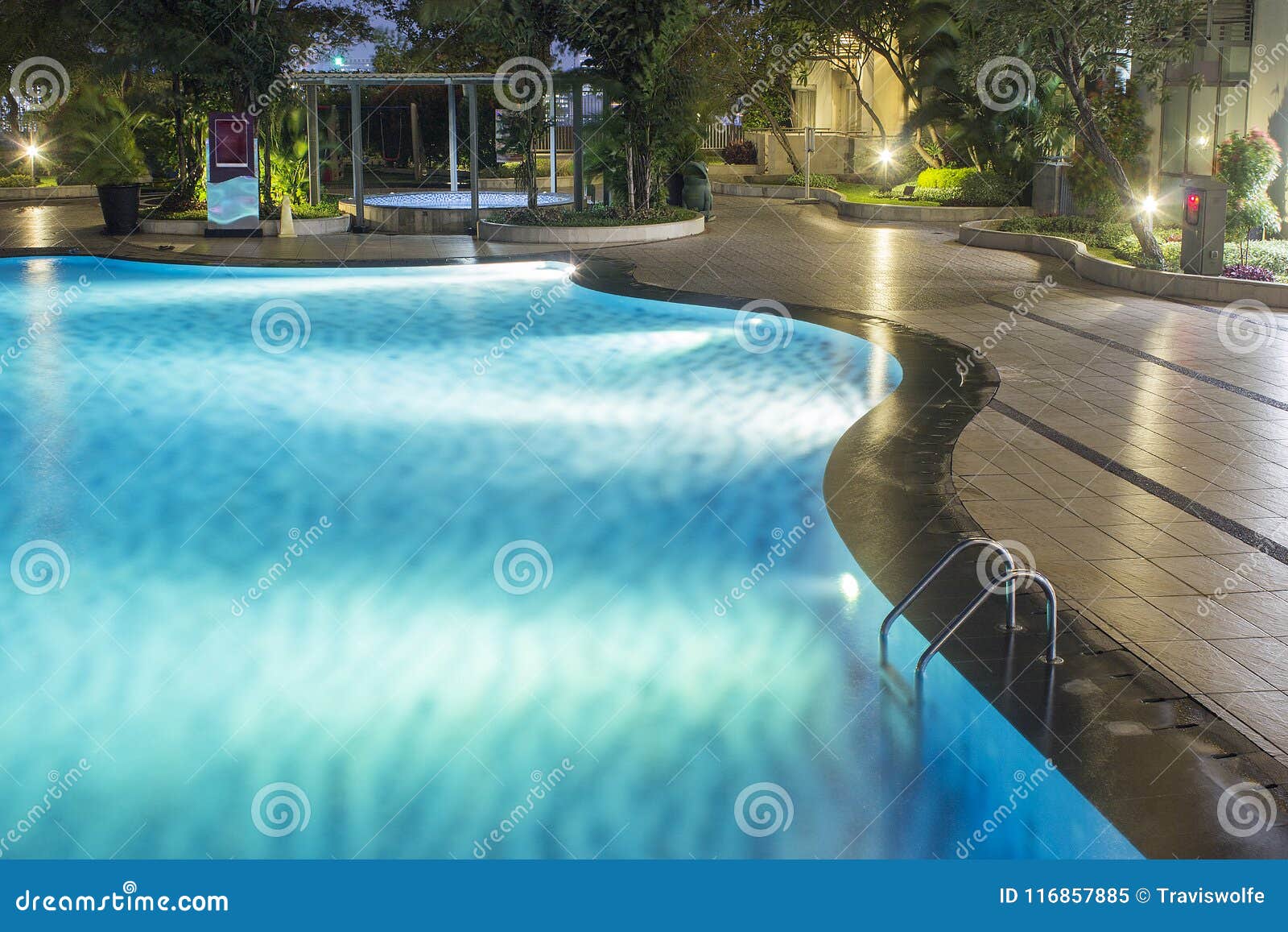 Pool at Night with Lush Greenery and Lighting for Home Design and ...