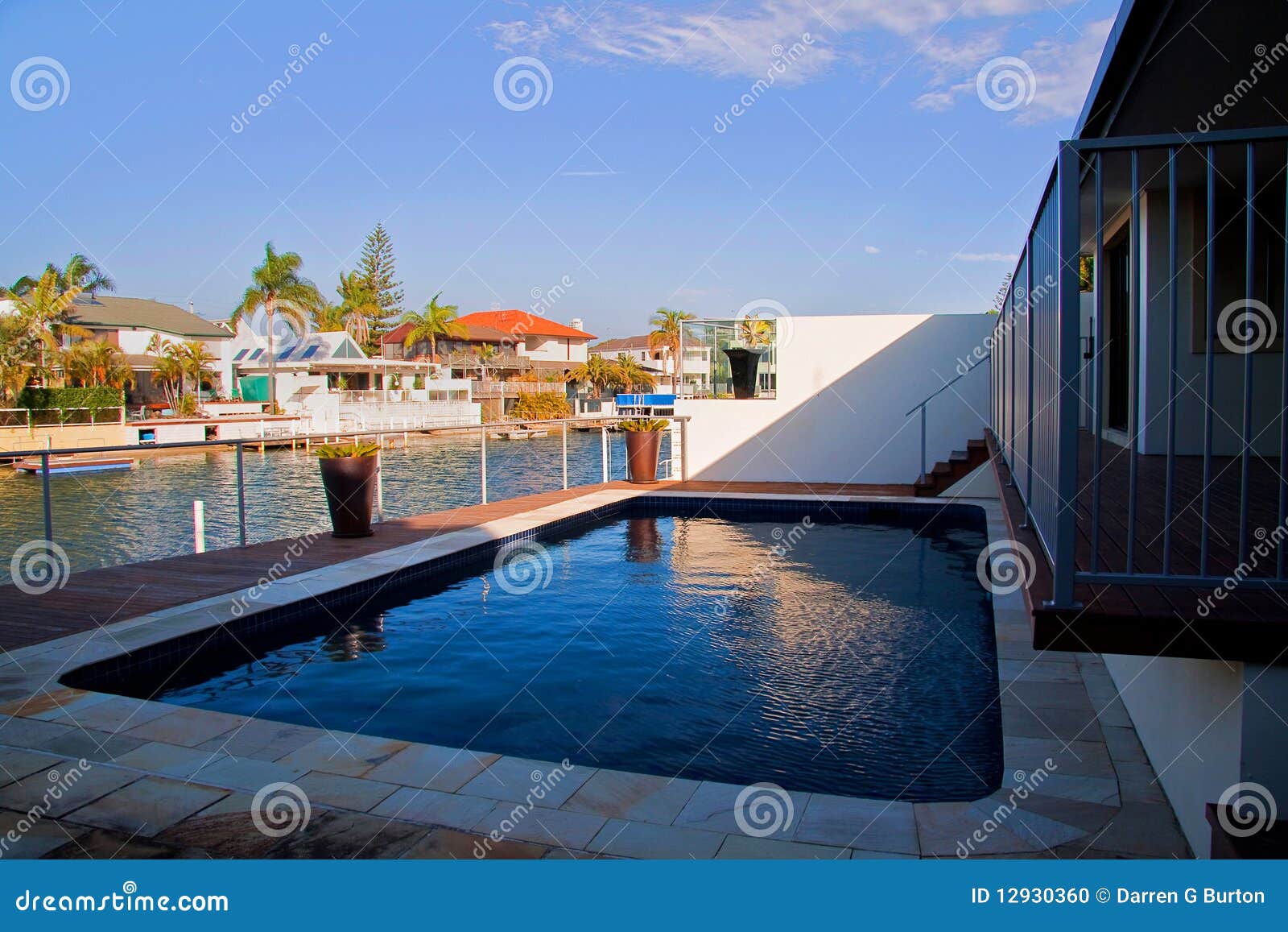 Pool Overlooking Canal stock photo. Image of waterfront - 12930360