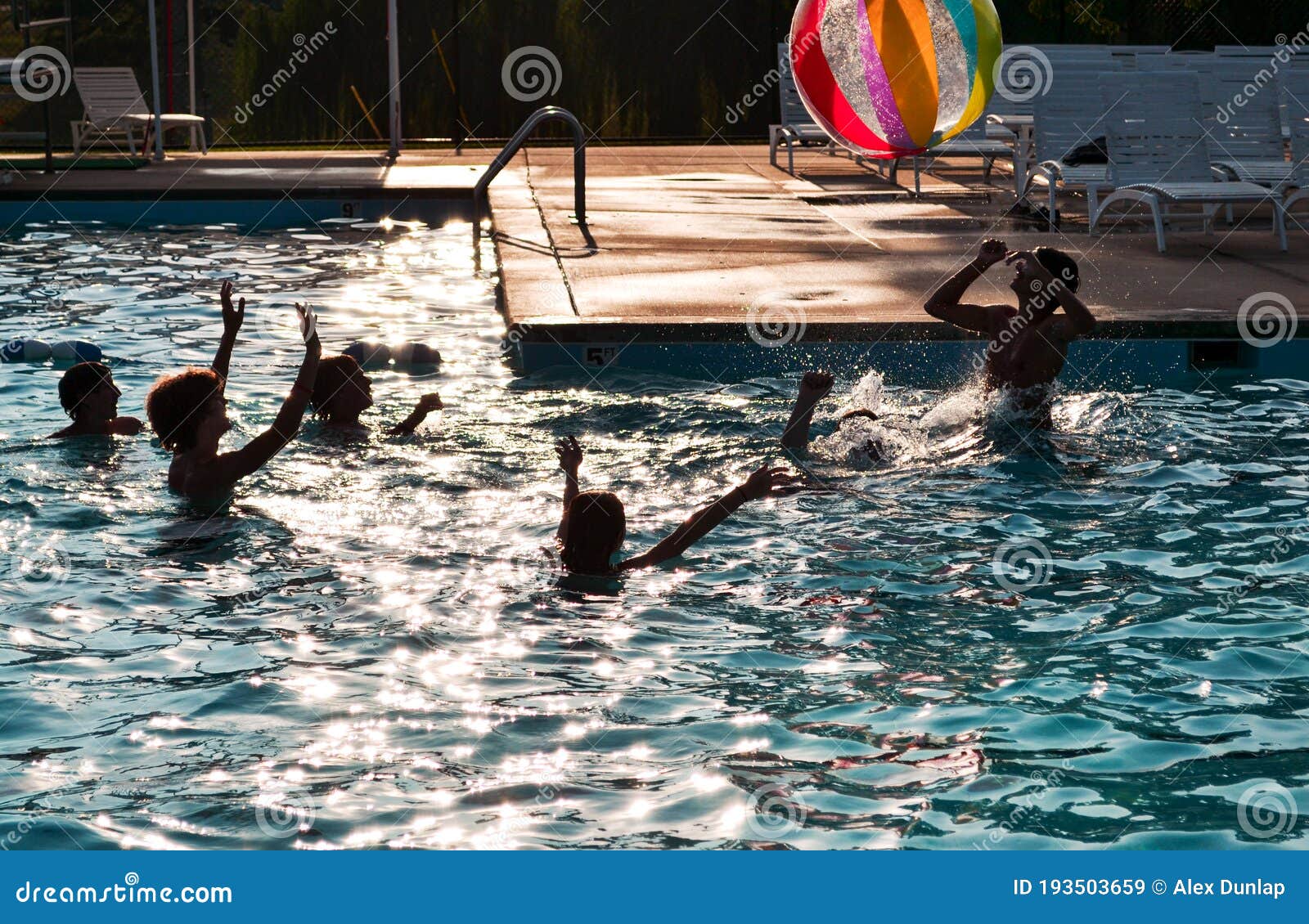Pool Party with a Beach Ball at Sunset Editorial Stock Image - Image of ...