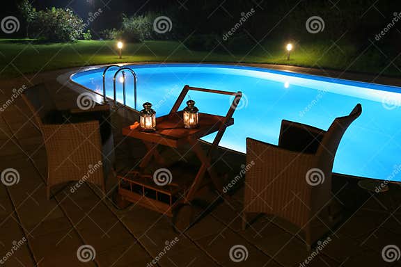 Pool and Patio by Night stock photo. Image of house, chair - 1732622