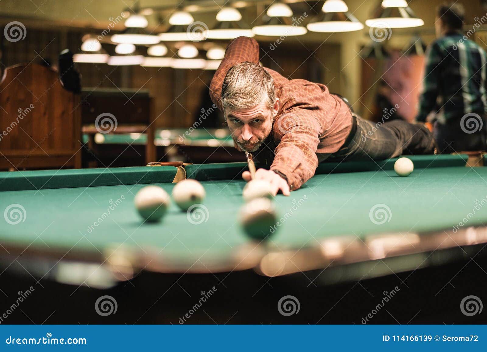 A Pool Player Takes Aim at the Ball Stock Image - Image of player ...