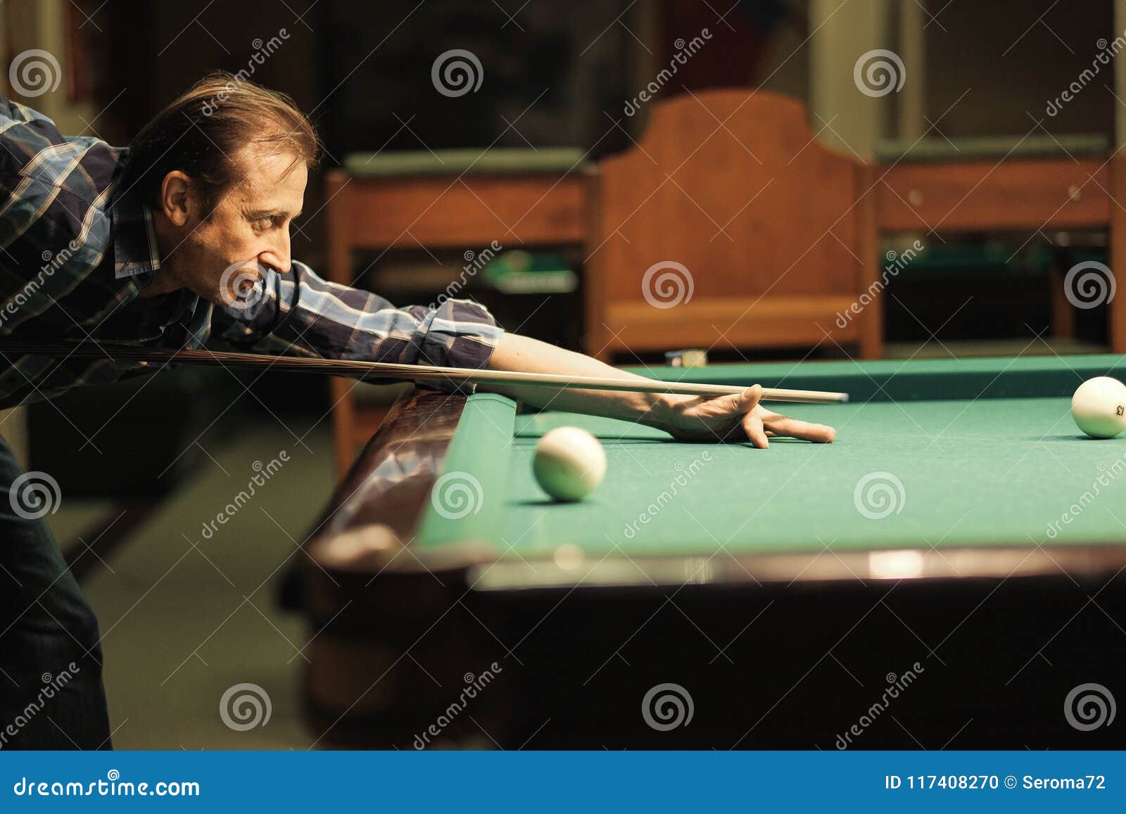 A Pool Player Takes Aim at the Ball Stock Photo - Image of aiming ...